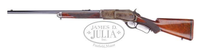 ENGLISH PROOFED WINCHESTER 1876 DELUXE EXPRESS LEVER ACTION RIFLE.