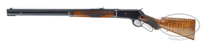 OUTSTANDING WINCHESTER MODEL 1886 DELUXE TAKE-DOWN LEVER ACTION RIFLE.