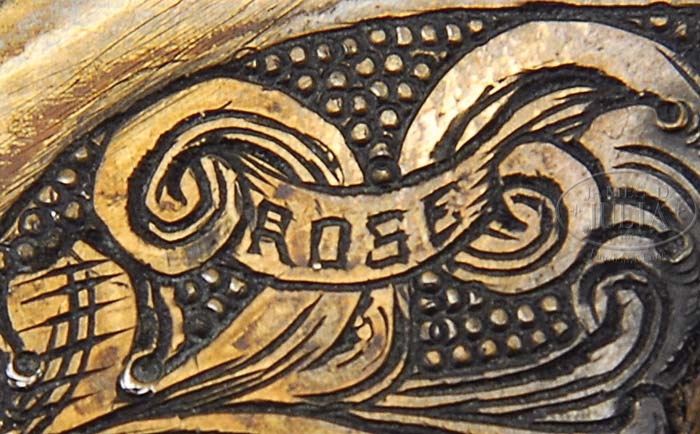 EXTRAORDINARY ROSE ENGRAVED WINCHESTER MODEL 1873 LEVER ACTION RIFLE.