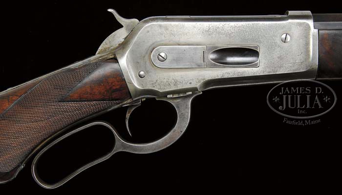 WINCHESTER MODEL 1886 DELUXE LEVER ACTION RIFLE.