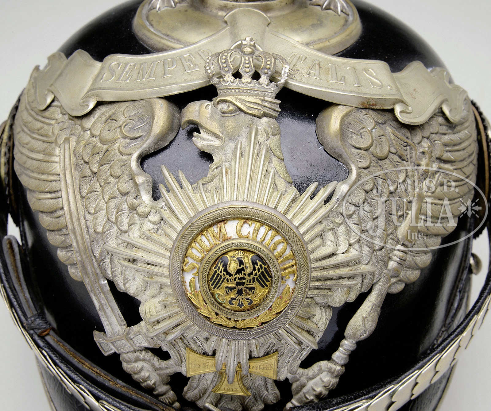 TWO PRUSSIAN FIRST GUARD OF FOOT OFFICER’S HELMETS.