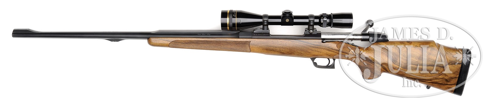 CHAMPLIN “KEITH GRADE” BOLT ACTION RIFLE WITH SCOPE.