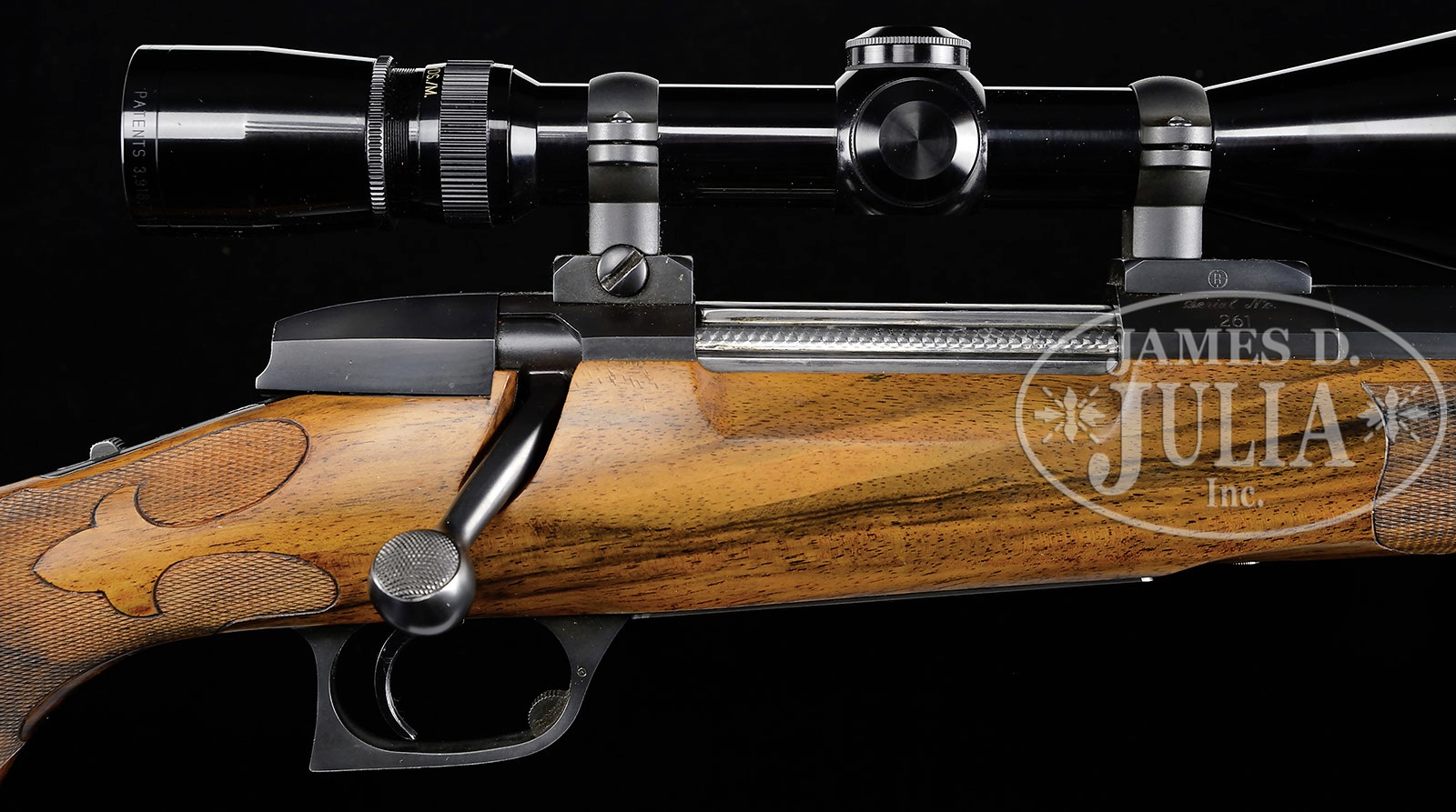 CHAMPLIN “KEITH GRADE” BOLT ACTION RIFLE WITH SCOPE.