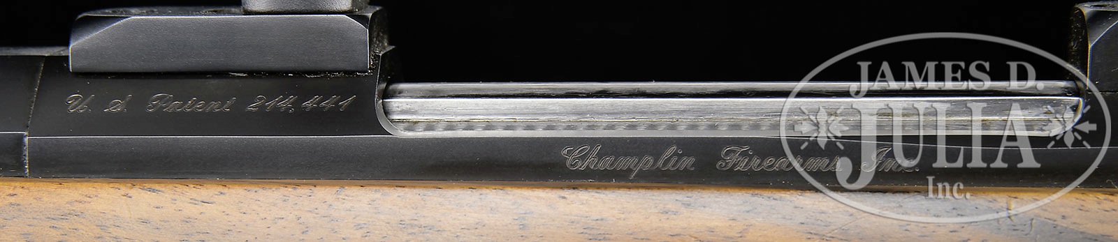 CHAMPLIN “KEITH GRADE” BOLT ACTION RIFLE WITH SCOPE.